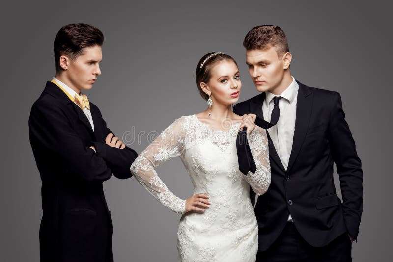 Two Handsome Men and Beautiful Bride, Studio Stock Photo - Image of ...