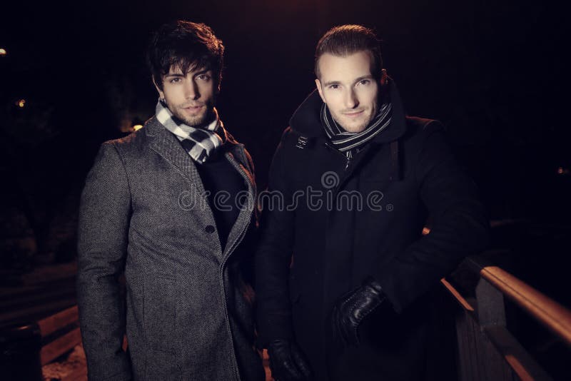 Two Handsome Men Wearing a Long Jacket Stock Image - Image of adult ...
