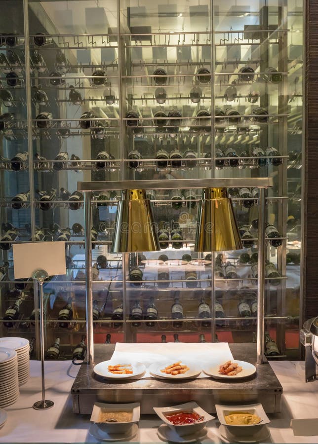 Two Hanging Lights Interior Illuminated To Buffet Line with Wine Stock ...
