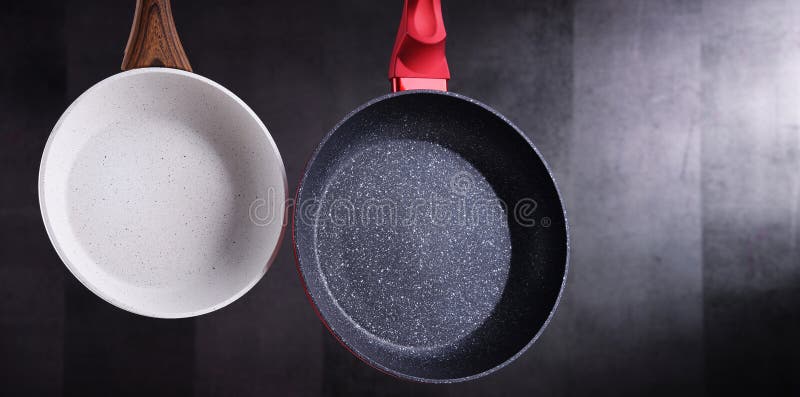 Two Hanging Stainless Frying Pans Stock Image - Image of eating, shiny ...