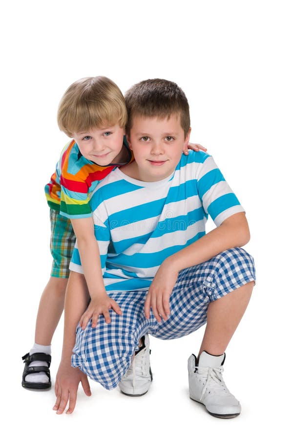 Two happy brothers stock photo. Image of children, isolated - 64157928