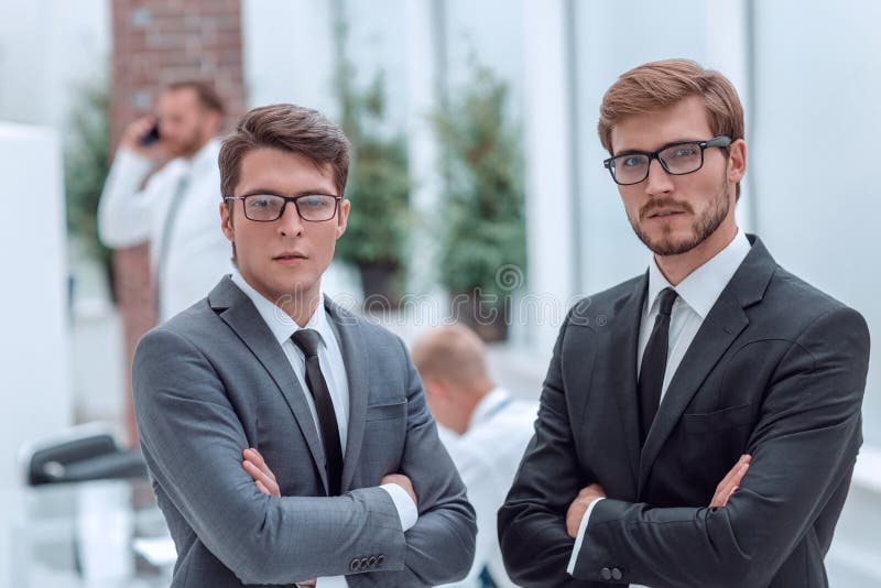 Two Happy Business Partners Standing in the Office Stock Photo - Image ...