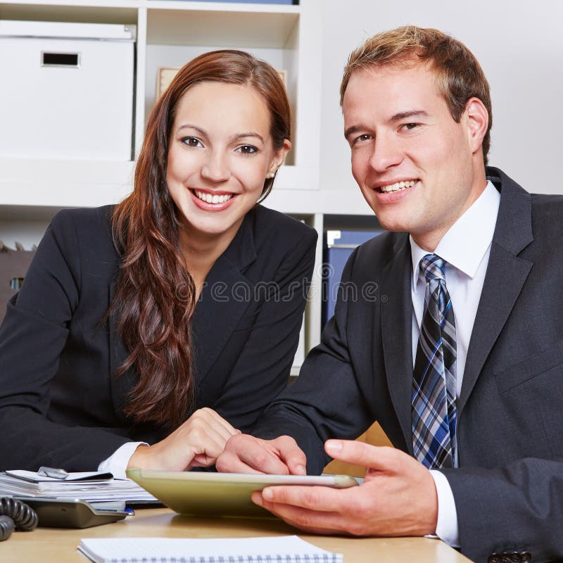 Two Happy Business People in Office Stock Photo - Image of team ...