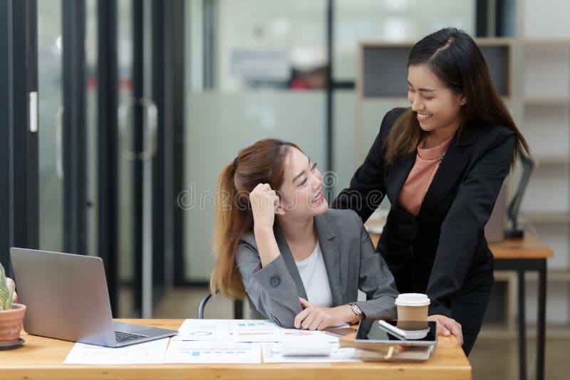 Two Happy Business Person Discuss at Workplace Stock Photo - Image of ...