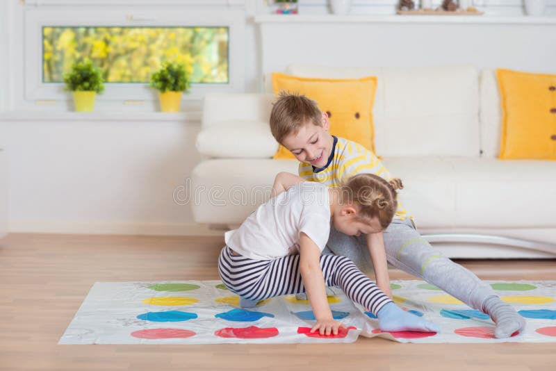Two Happy Children Playing Exciting Game at Home Stock Image - Image of ... Two Happy Children Playing Exciting Game at Home Stock Image - Image of ...