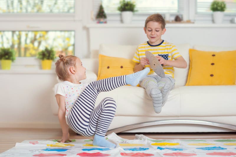 Two Happy Children Playing Exciting Game at Home Stock Image - Image of ... Two Happy Children Playing Exciting Game at Home Stock Image - Image of ...