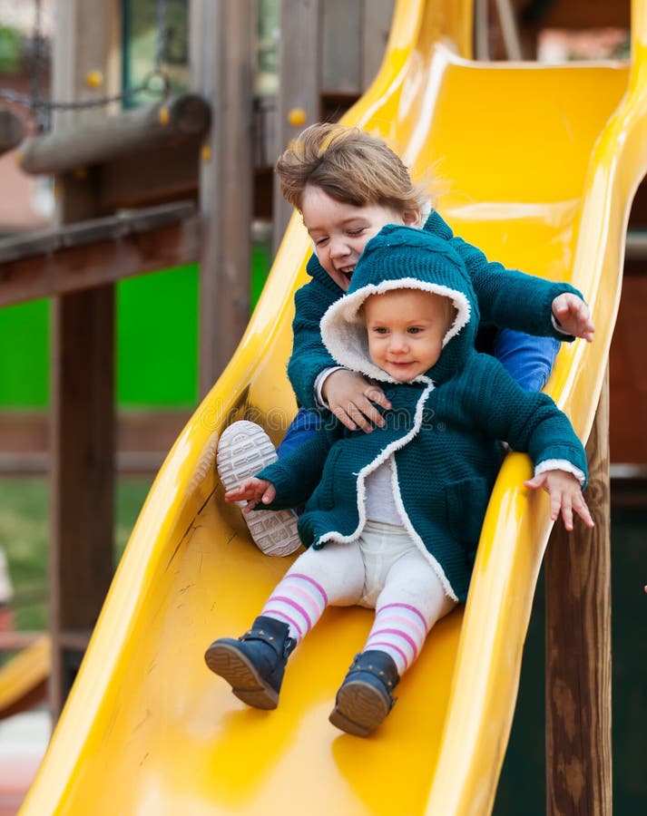 6,170 Children Playing Playground Slide Stock Photos - Free & Royalty ...