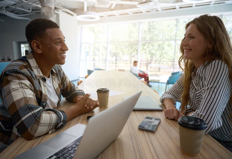 Two Happy Colleagues Talking in Office Lobby Stock Image - Image of ...