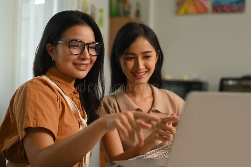 Two Happy College Students Preparing for Exams, Learning Together in ...