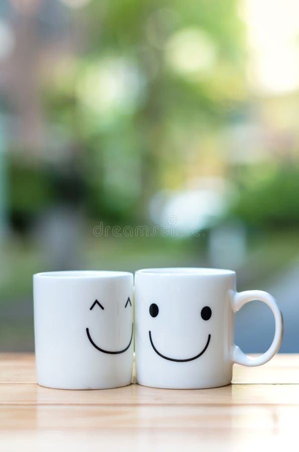 Two Happy Cups on Wood Table with Bokeh, about Love Concept Stock Image ...
