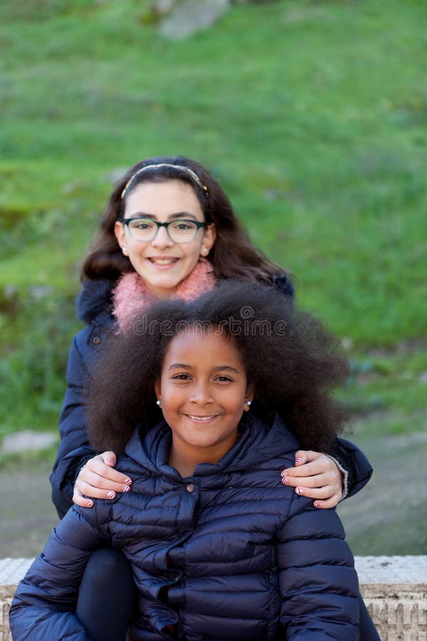 Two Happy Girls in the Park Stock Photo - Image of caucasian, family ...