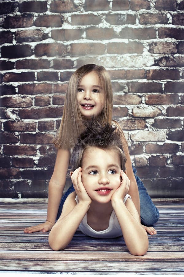 Two happy kids in studio stock image. Image of people - 36983113