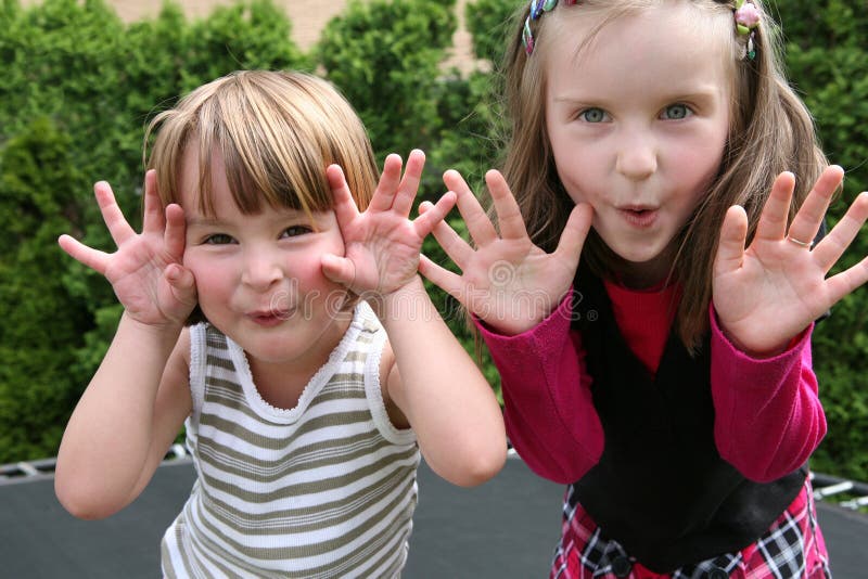 Two happy little girls. stock image. Image of girl, life - 9631395 Two happy little girls. stock image. Image of girl, life - 9631395