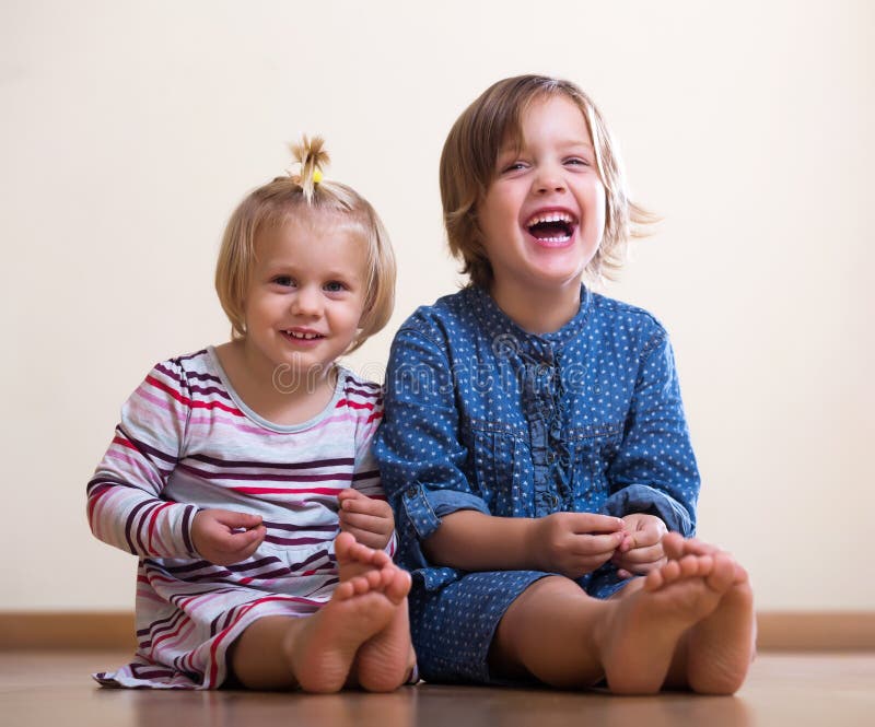 Two happy little sisters stock photo. Image of children - 51240594