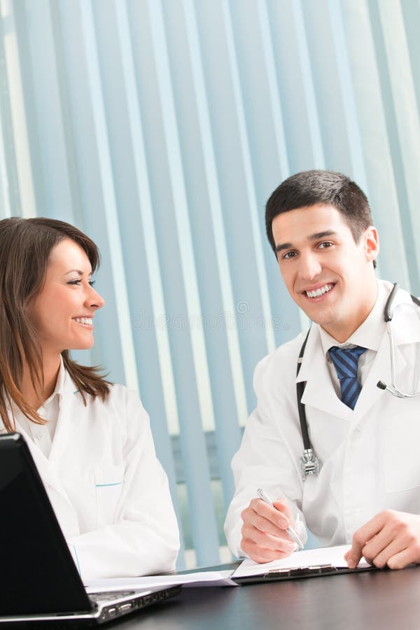 Two Happy Medical People Working Stock Image - Image of portrait, male ...