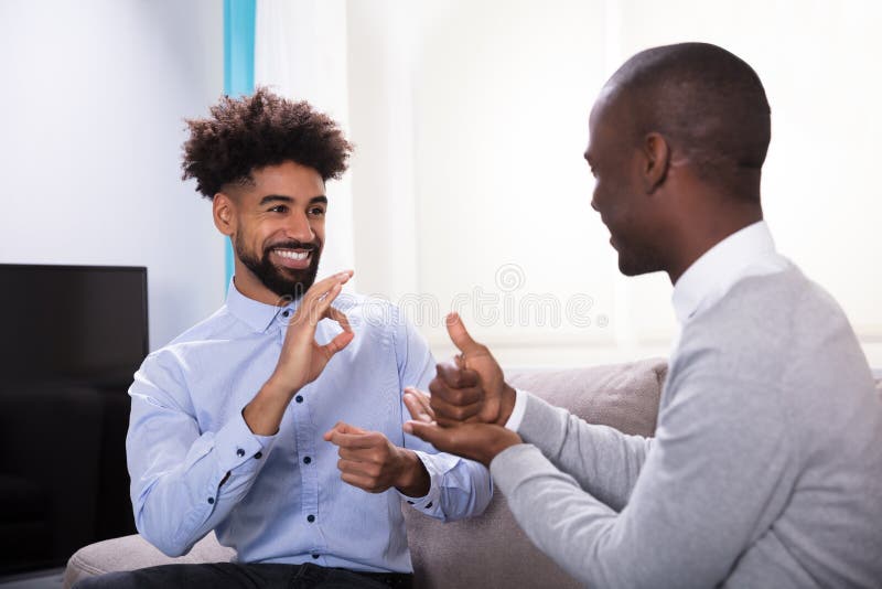 Two Happy Men Making Sign Language Stock Photo - Image of apartment ...
