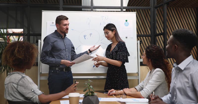 Two Happy Multiethnic Conference Speakers Team Work Together Give ...