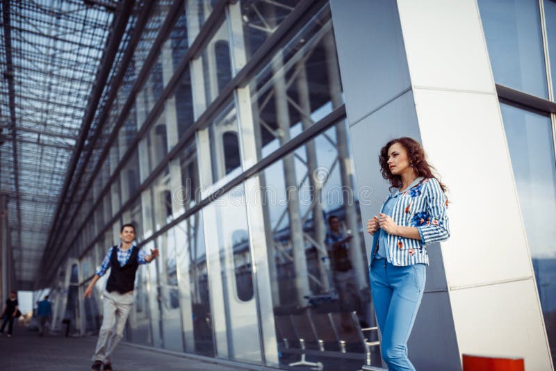 Two Happy People at the Airport Stock Image - Image of couple, female ...