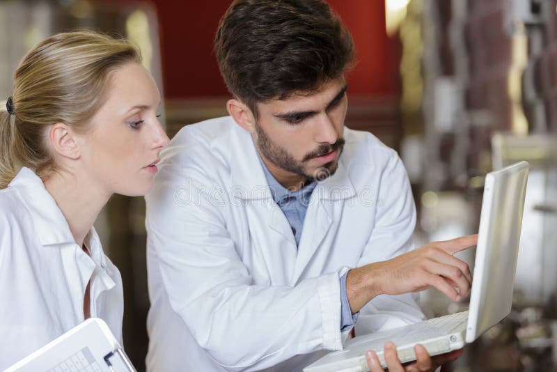 Two Happy Researchers in Labcoats Stock Photo - Image of labcoat ...