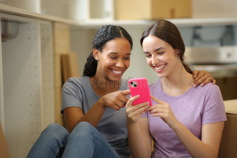 Two Happy Roommates Checking Phone Moving House Stock Image - Image of ...