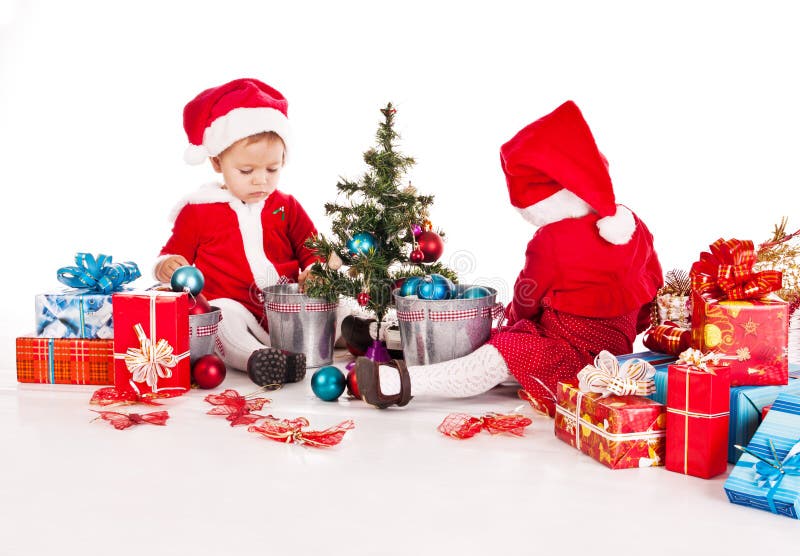 Two happy santa helpers stock image. Image of claus, happiness - 32774553