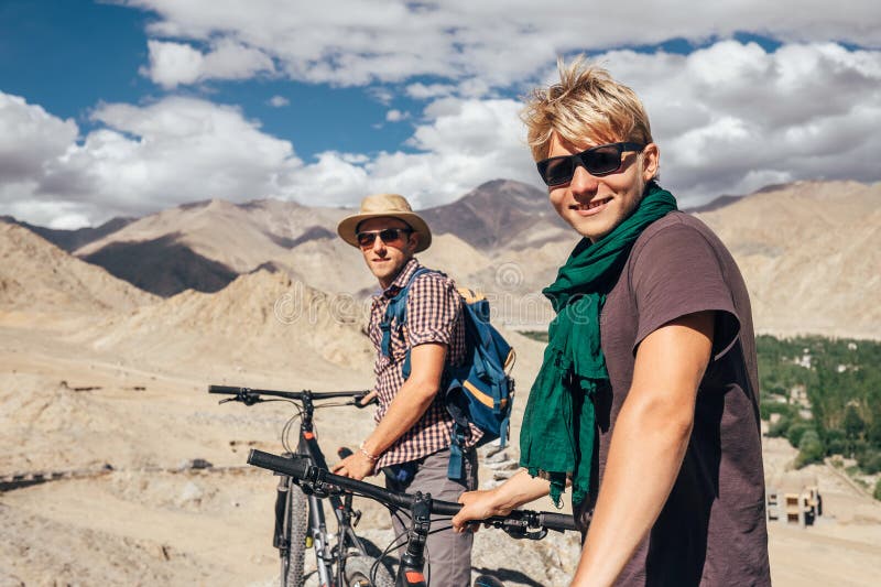 Teenager Bikers Hugging at Lakeside Stock Image - Image of helmet ...