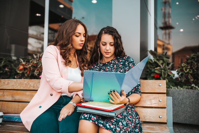 Two Happy Students Reading Document Together, Checking Paper Notes ...