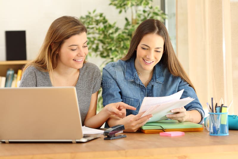 Happy Students Studying Checking Notes at Home Stock Photo - Image of ...