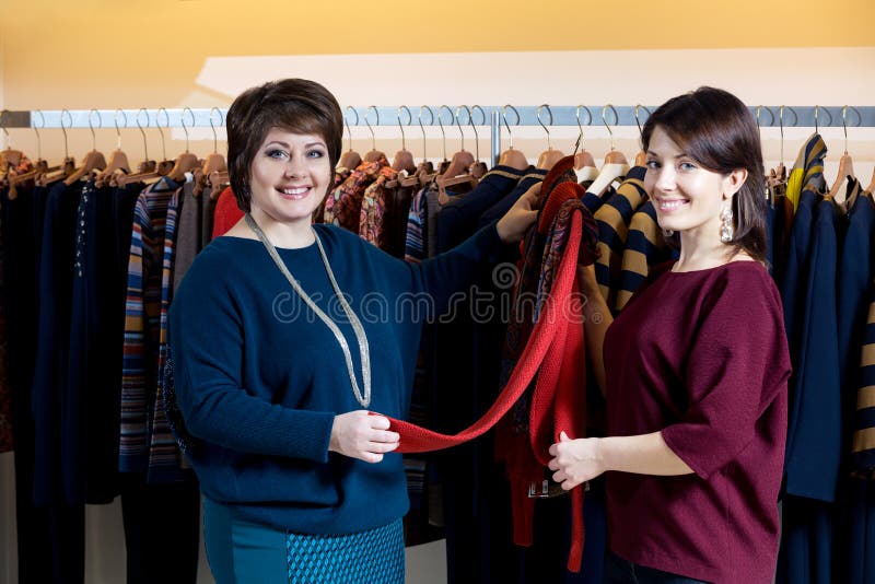 Two Happy Women Shopping in Clothes Store Stock Image - Image of inside ...