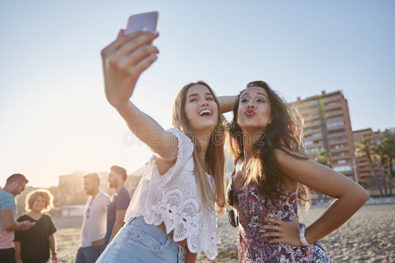 Two Happy Women Taking Selfie On Beach Having Fun Stock Image Image
