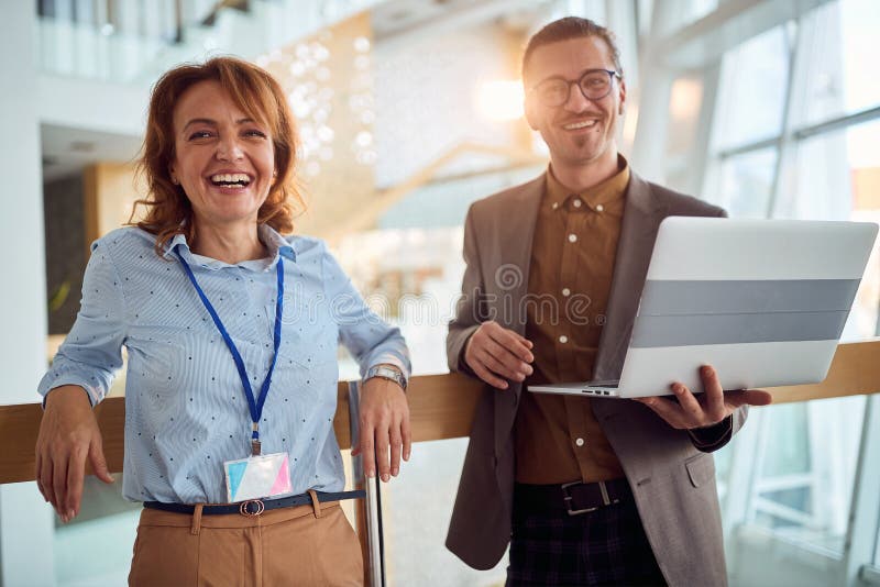 Two Happy Work Colleagues Consulting Stock Image - Image of business ...