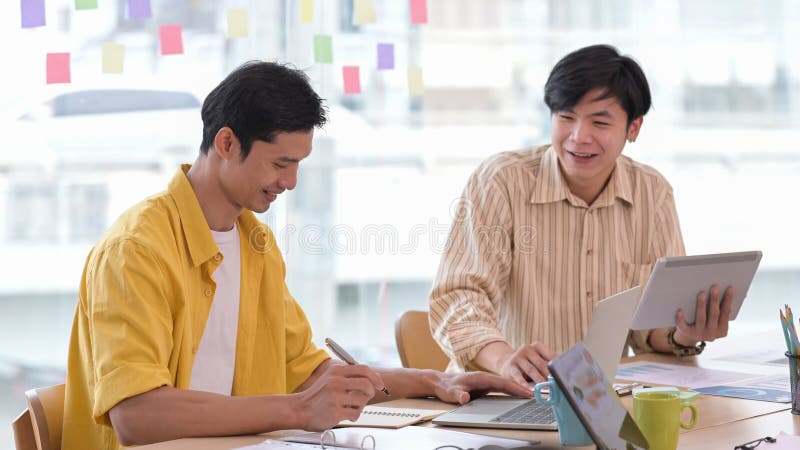Two Happy Creative Man Working Together at Modern Workplace. Stock ...