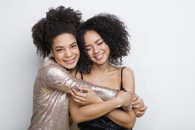 Two Happy Young Women Hugging and Laughing Stock Image - Image of ...