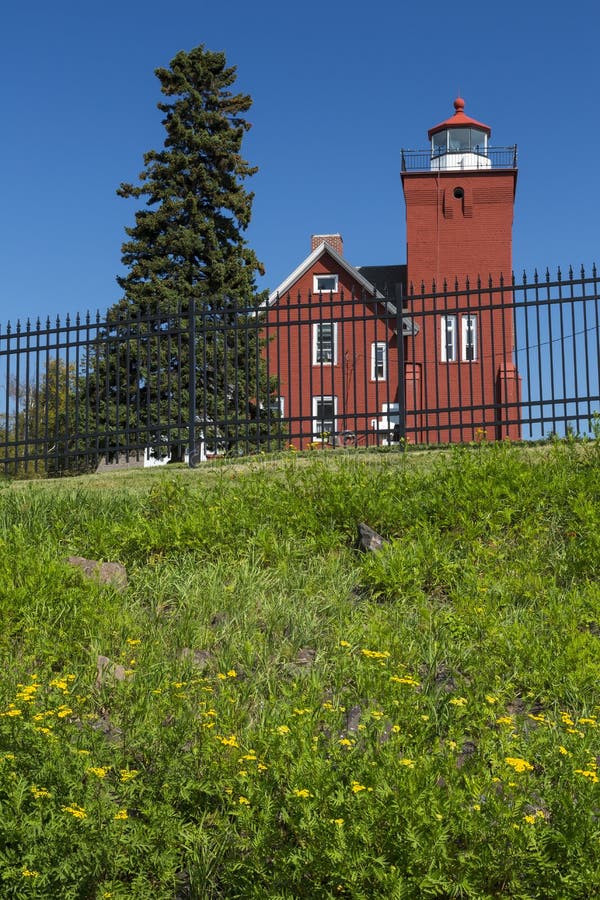 Two Harbors Lighthouse stock image. Image of coastline - 26881197