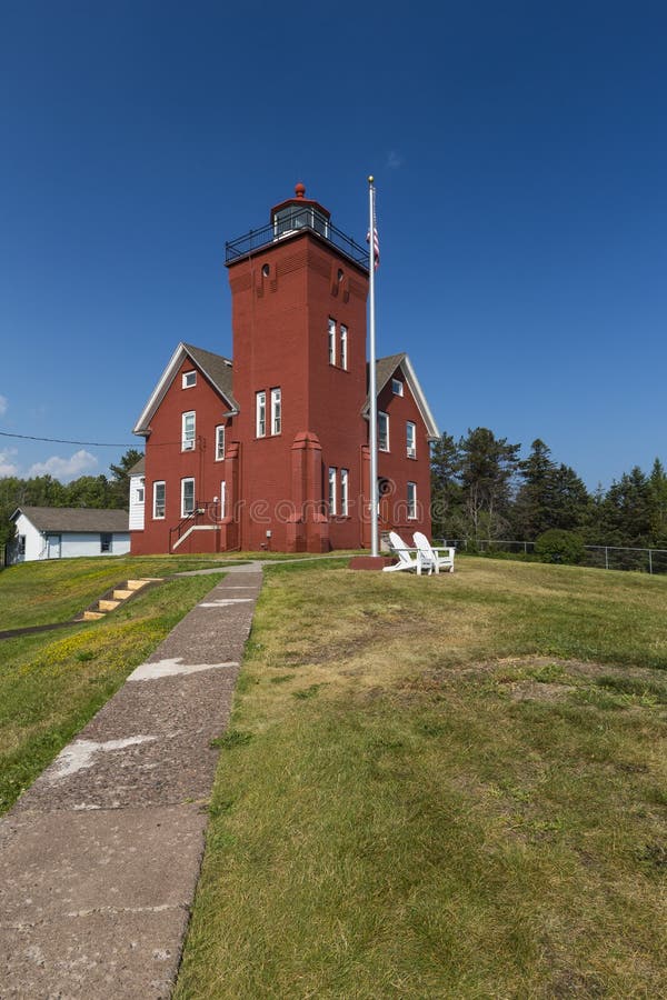 Two Harbors Lighthouse stock image. Image of coastline - 26881197