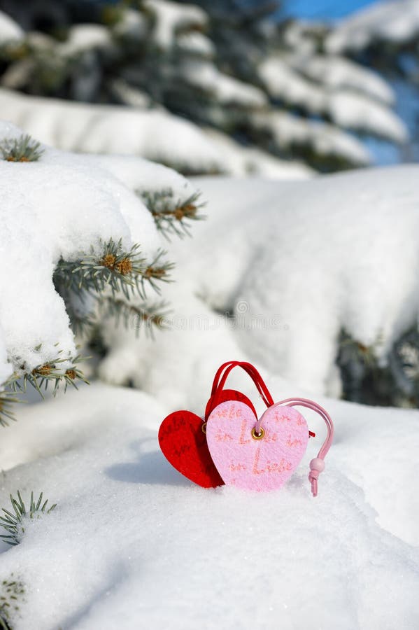 Two heart at snow stock image. Image of park, shadow - 29703569