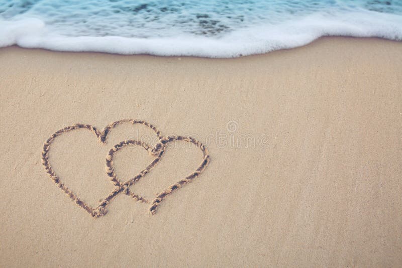 Two Hearts of Love on the Sand by the Caribbean Sea. Stock Image ...