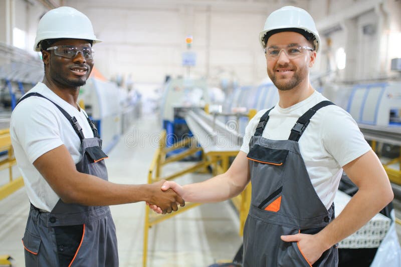 Two Heavy Industry Engineers Stand in Factory Stock Image - Image of ...