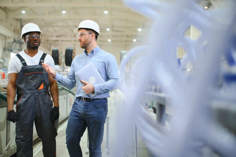Two Heavy Industry Engineers Stand in Factory Stock Photo - Image of ...