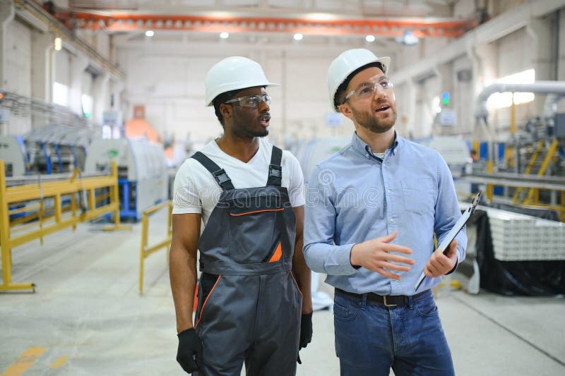 Two Heavy Industry Engineers Stand in Factory Stock Photo - Image of ...