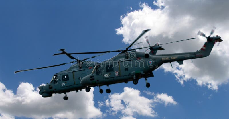 Two helicopters in sky stock photo. Image of helicopter - 54139640