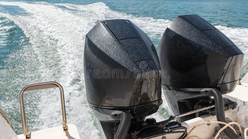 Two High-powered Engines Mounted on the Back of the Speedboat Stock ...