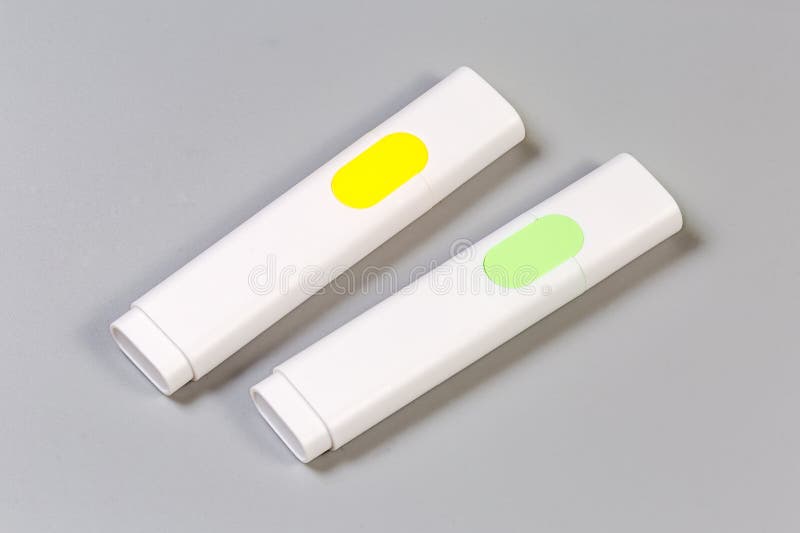 Two Highlighter Pens Differenr Colors on a Gray Background Stock Image ...