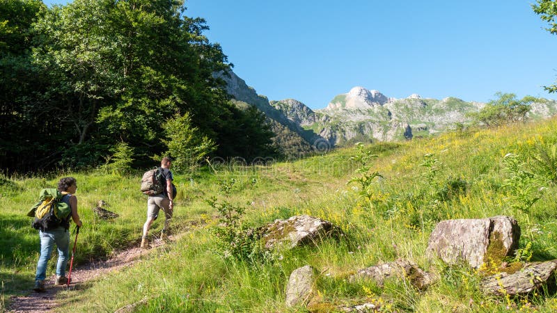 Two Hikers Walking in Pyrenees Mountains Stock Image - Image of ...