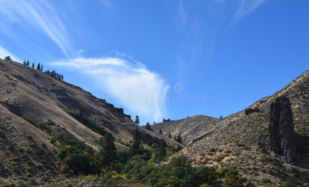 Between two hills stock photo. Image of scenic, blue - 83009602