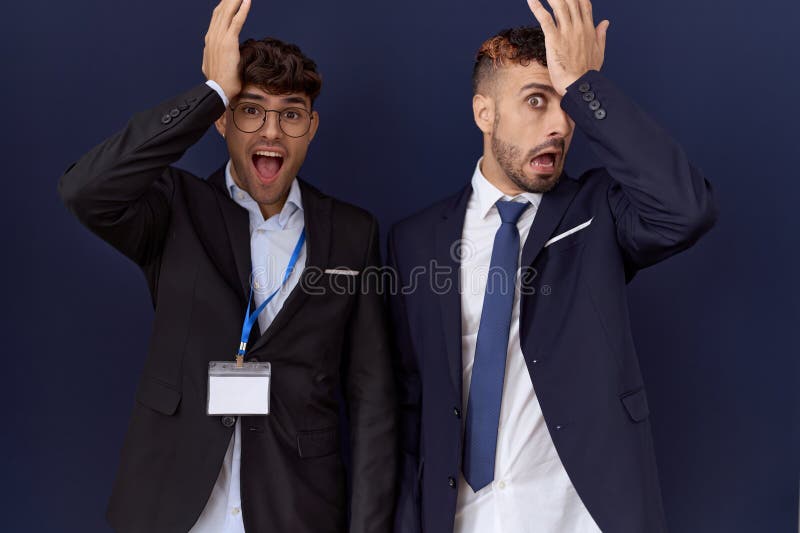 Two Hispanic Business Men Wearing Business Clothes Surprised with Hand ...
