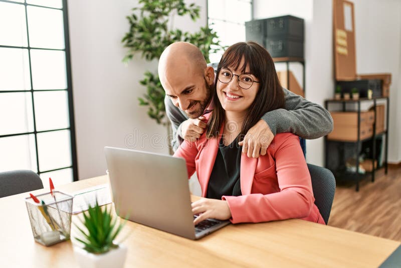 Two Hispanic Business Workers Smiling Happy Working at the Office Stock ...