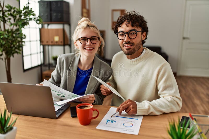 Two Hispanic Business Workers Smiling Happy Working at the Office Stock ...