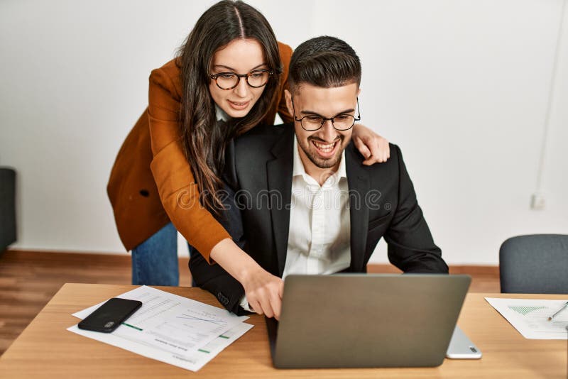 Two Hispanic Business Workers Smiling Happy Working at the Office Stock ...