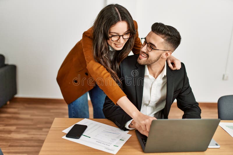 Two Hispanic Business Workers Smiling Happy Working at the Office Stock ...